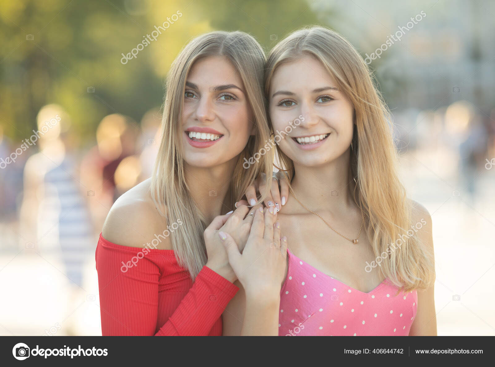 Two Attractive Young Girl Friends Standing Together Posing Camera ...