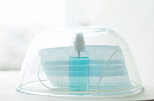 Coronavirus prevention medical surgical masks and hand sanitizer spray ...