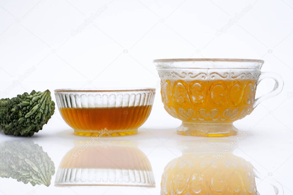 Té de hierbas desintoxicante popular aislado en blanco, es decir Melón ...