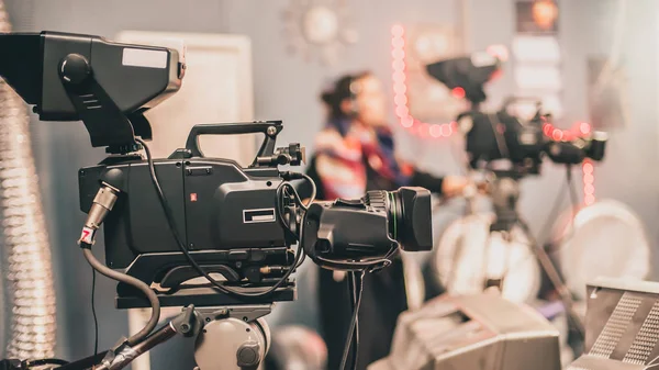 Behind the scene. Multiple camera setup. Cameraman shooting the film ...