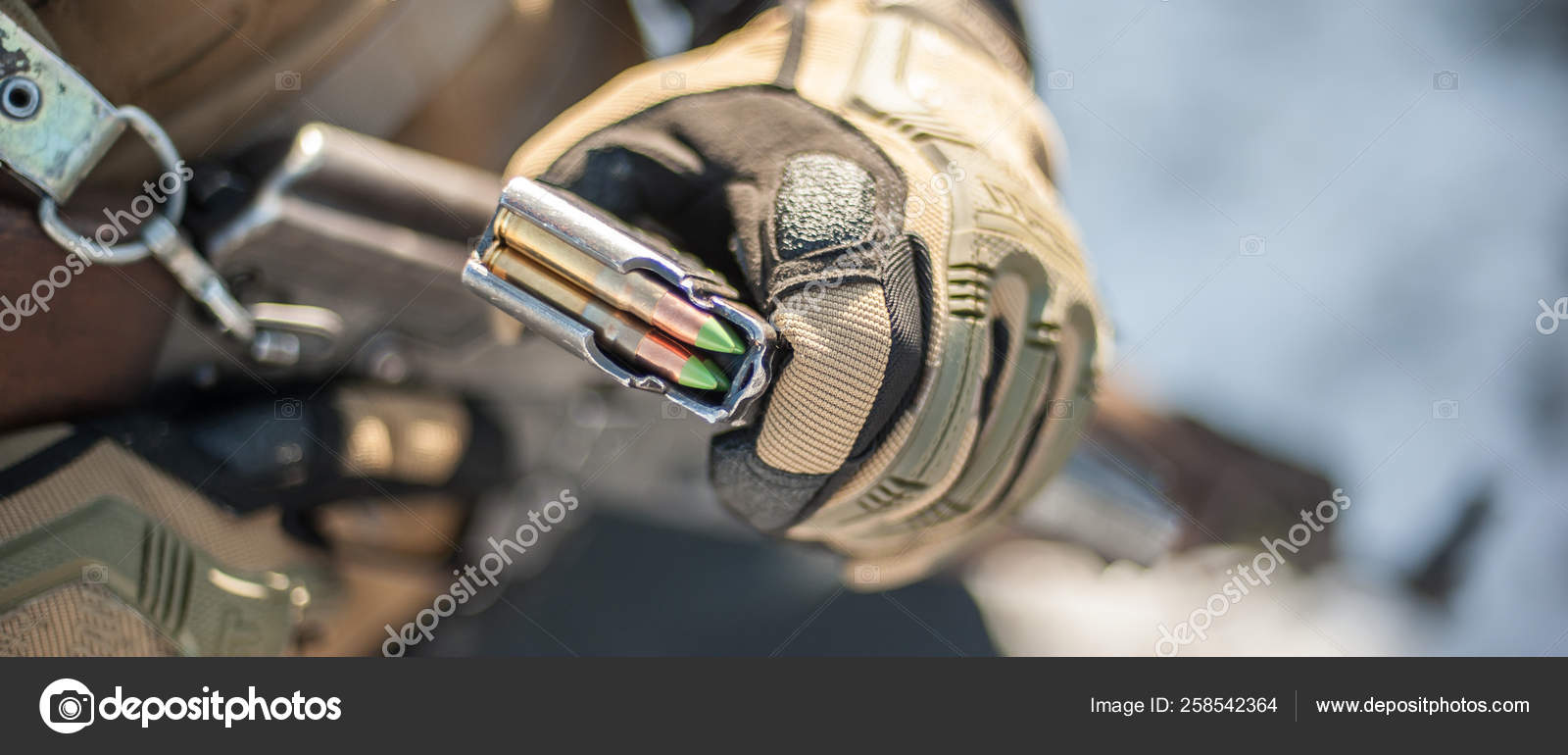 Soldier hands load rifle machine gun bullets into cartridge clip Stock ...