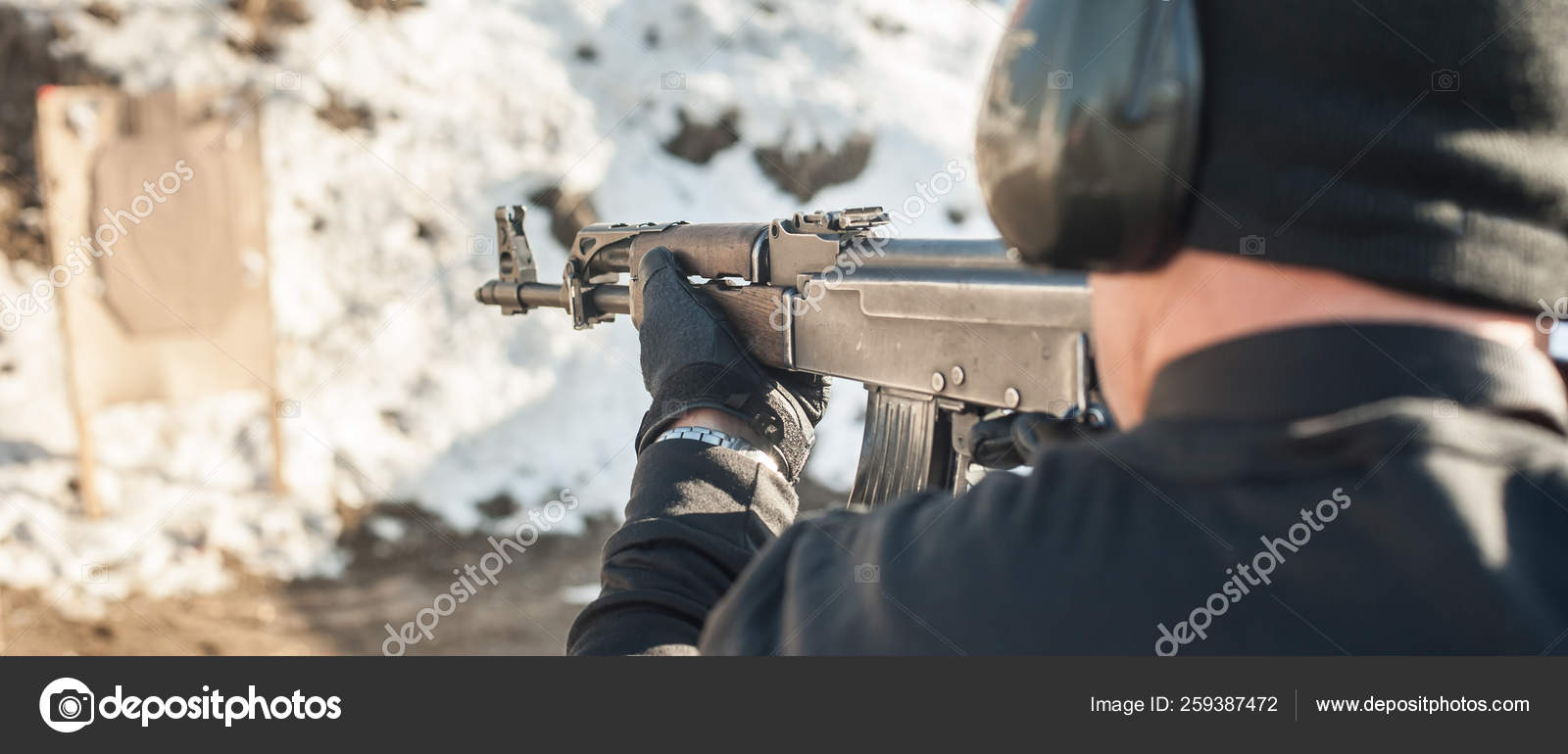 Civilian shooting training from rifle machine gun on shooting range ...