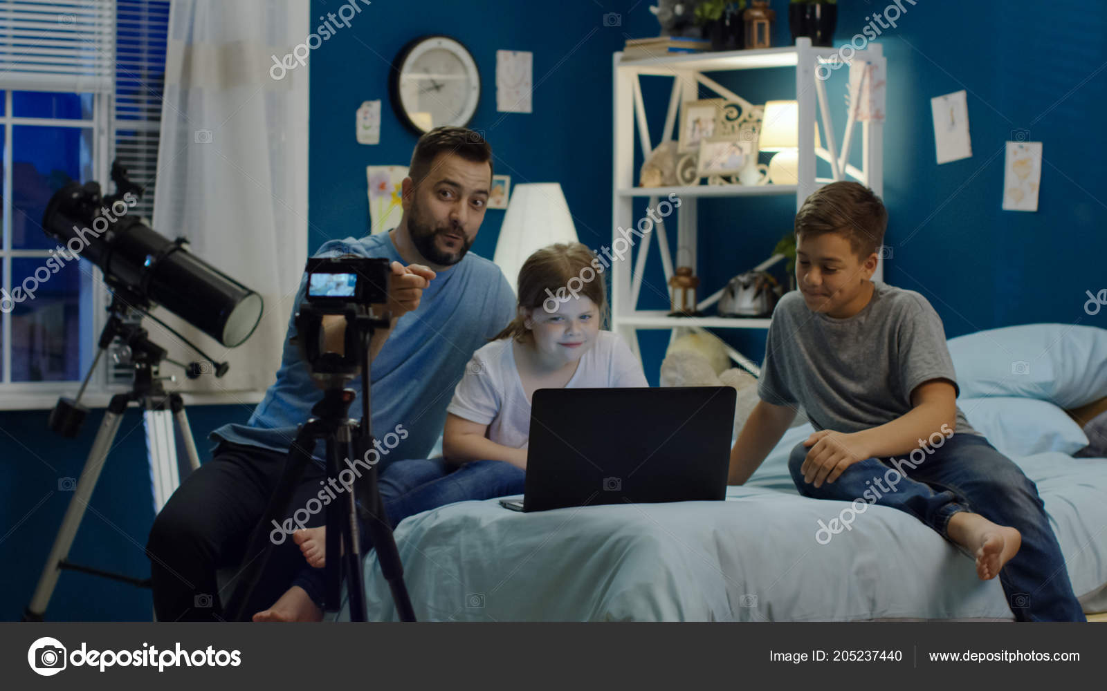Man with kids making video at home — Stock Photo © EvgeniyShkolenko ...