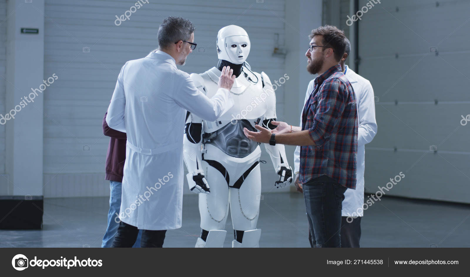 Scientists testing a humanoid robots hand movement — Stock Photo ...