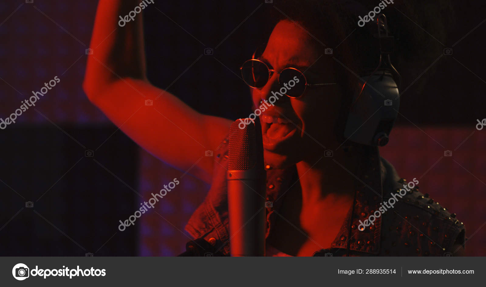 Woman singing in recording booth — Stock Photo © EvgeniyShkolenko ...