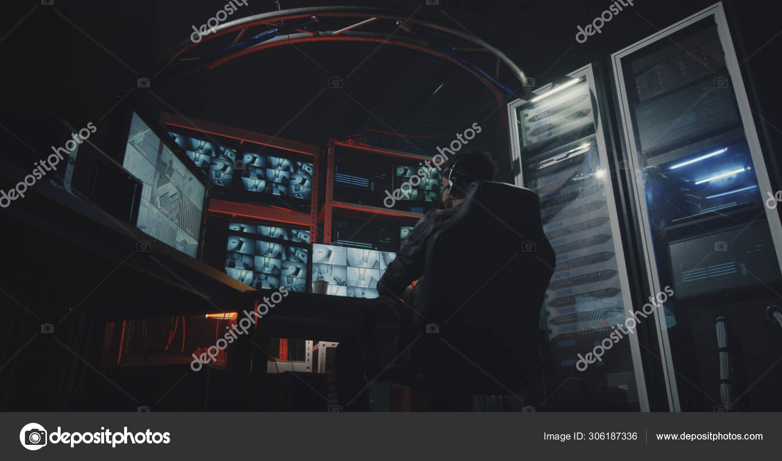 Hacker watching security camera footage — Stock Photo ...