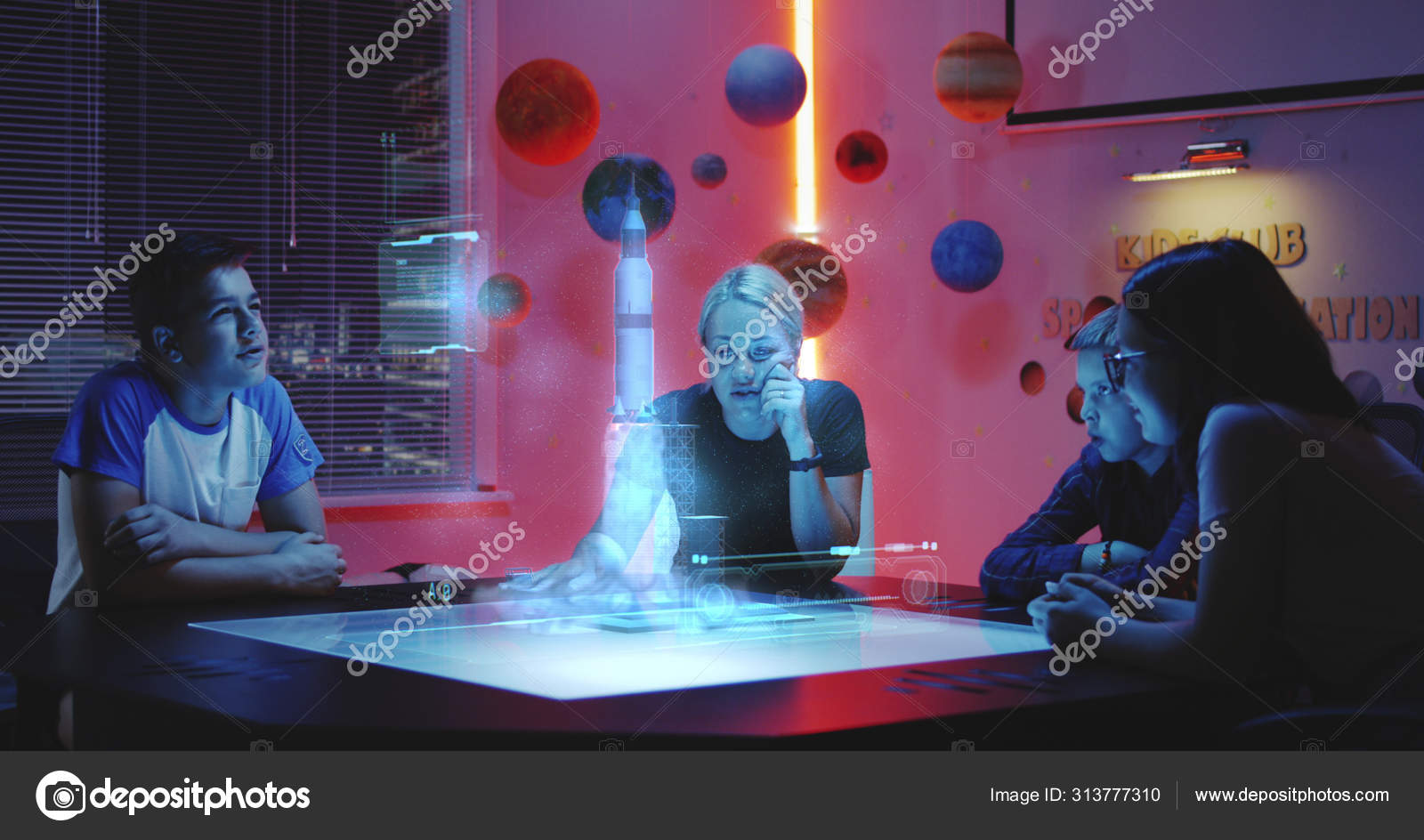 Teacher giving a class on space exploration — Stock Photo ...