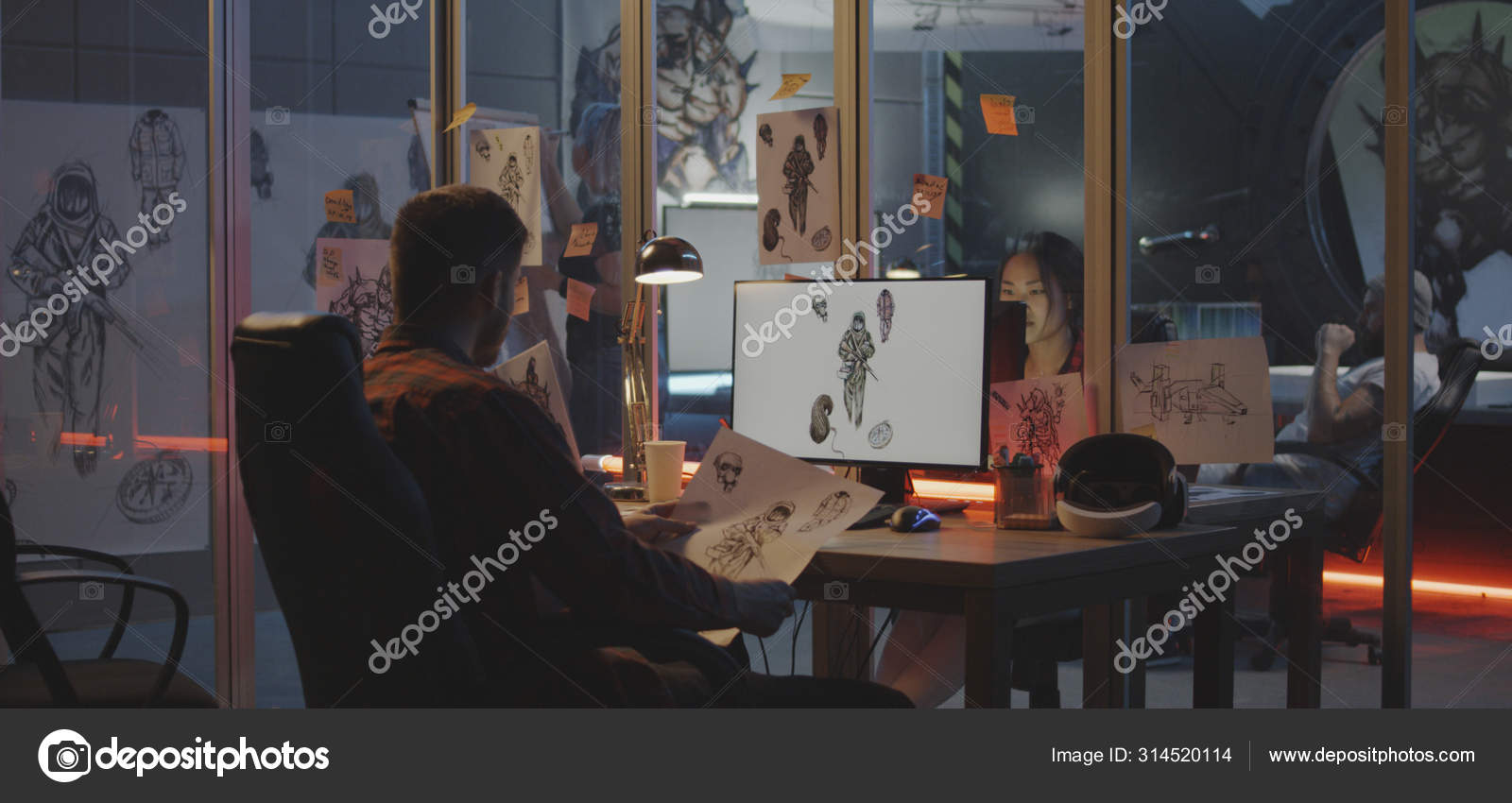 Graphic designer drawing video game art — Stock Photo ...