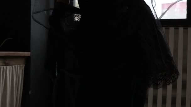 Girl takes off robe — Stock Video © 3kstudio #229809564