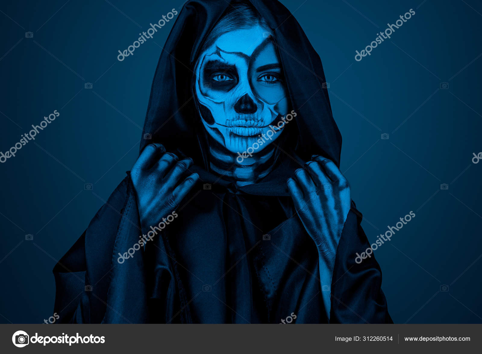 Female death in hooded cloak under blue light Stock Photo by ©kegfire ...