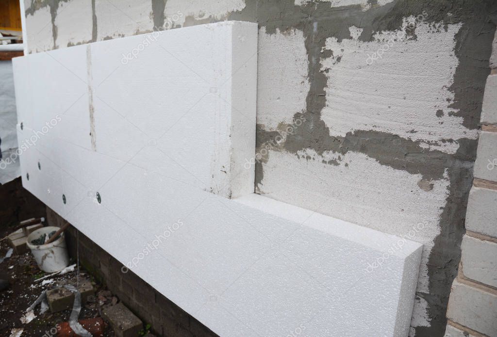 Aislamiento rígido de la pared de la casa de poliestireno extruido. Casa aislante bloques de ...