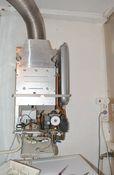 Repair of a gas boiler, setting up and servicing gas boiler. - Stock ...