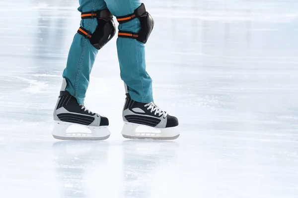 feet rolling on skates man on the ice rink - Stock Image - Everypixel