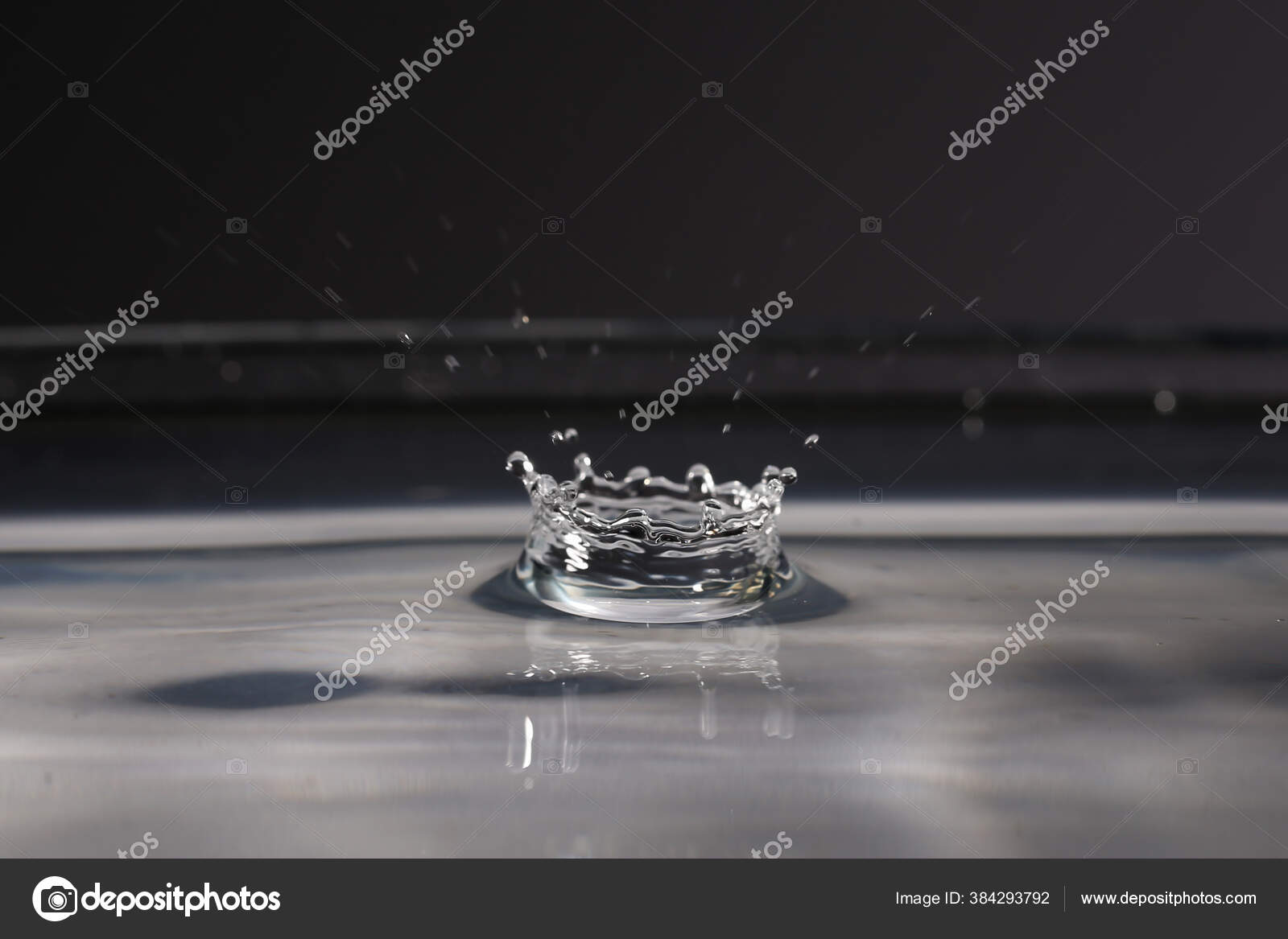 Small Water Drop Fall Water Surface — Stock Photo © Malleo #384293792