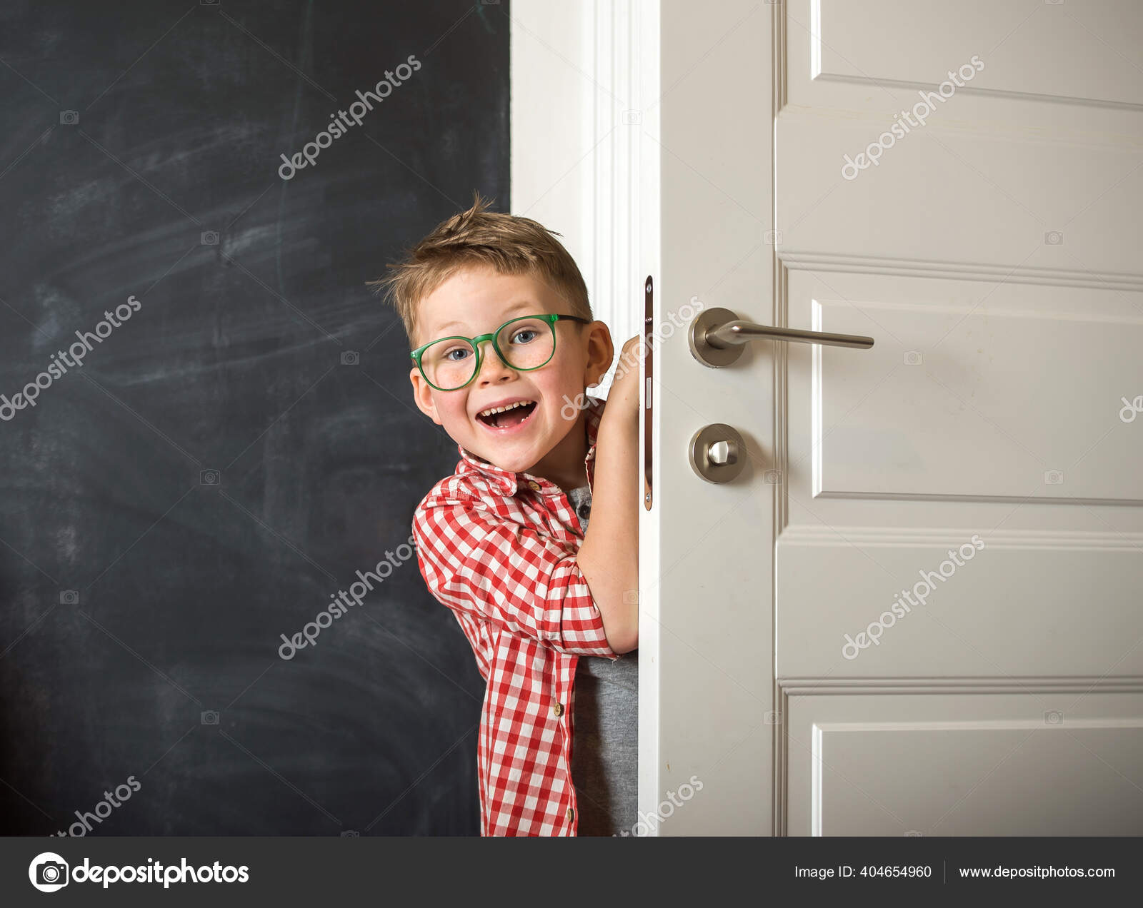 Child Holding Door Open At School