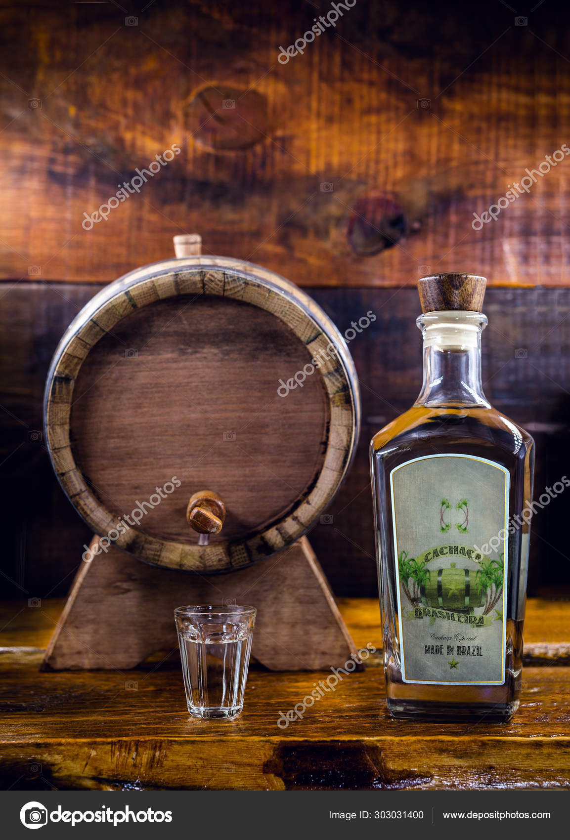 Brazilian Cachaca Bottle over a rustic table Stock Photo by ...