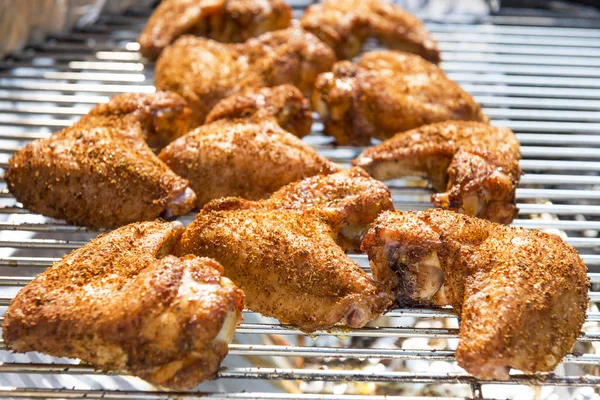 Indirect cooking Chicken wings on the barbecue grill - Stock Image ...
