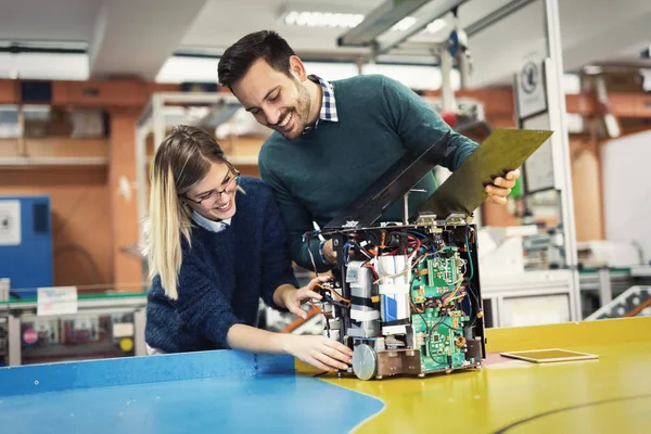 Engineering students working in the lab — Stock Photo © stockasso #96585664