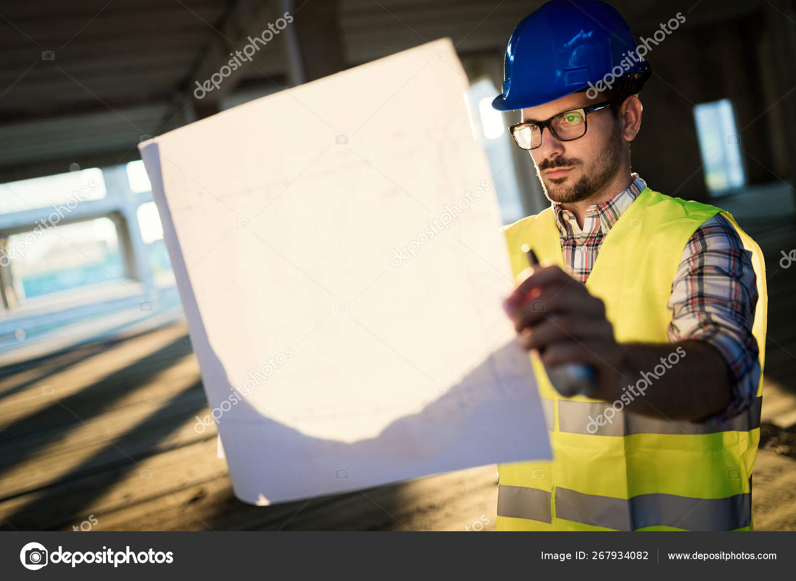 Handsome Engineer Working Construction Site Holding Blueprint Stock ...