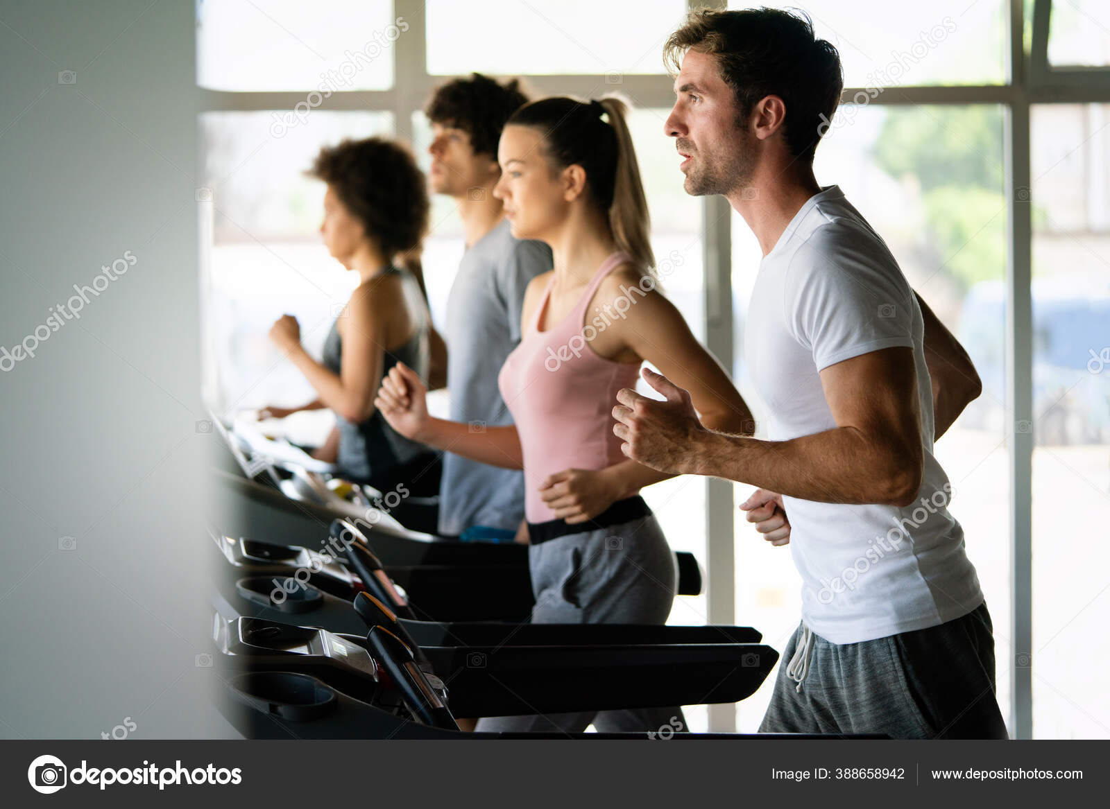 Group Happy Fit People Gym Exercising Stock Photo by ©nd3000 388658942