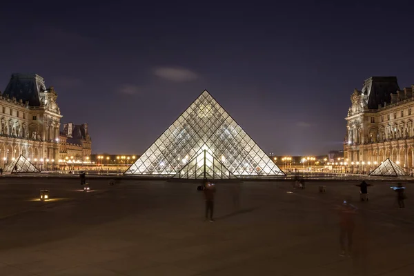 Louvre Museum in Paris at nightis. A central landmark of Paris, – Stock ...