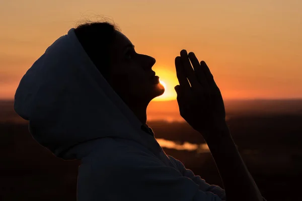 Praying at sunset Stock Photos, Royalty Free Praying at sunset Images ...