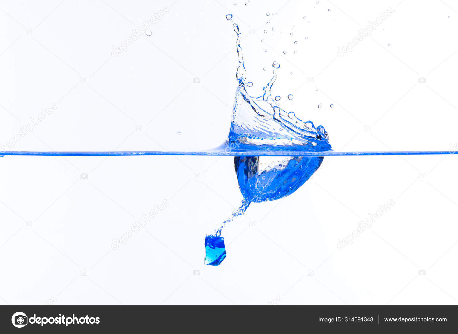 Beautiful and cool splashes of water from falling into it blue t ...