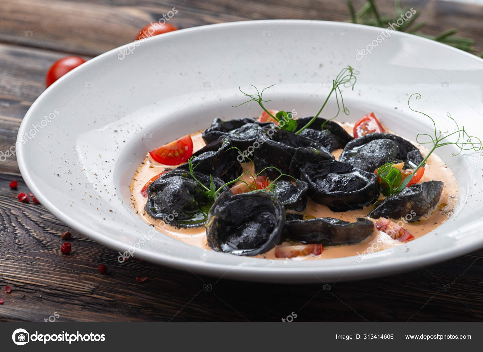 Black ravioli in a plate close-up Stock Photo by ©Palplaner 313414606