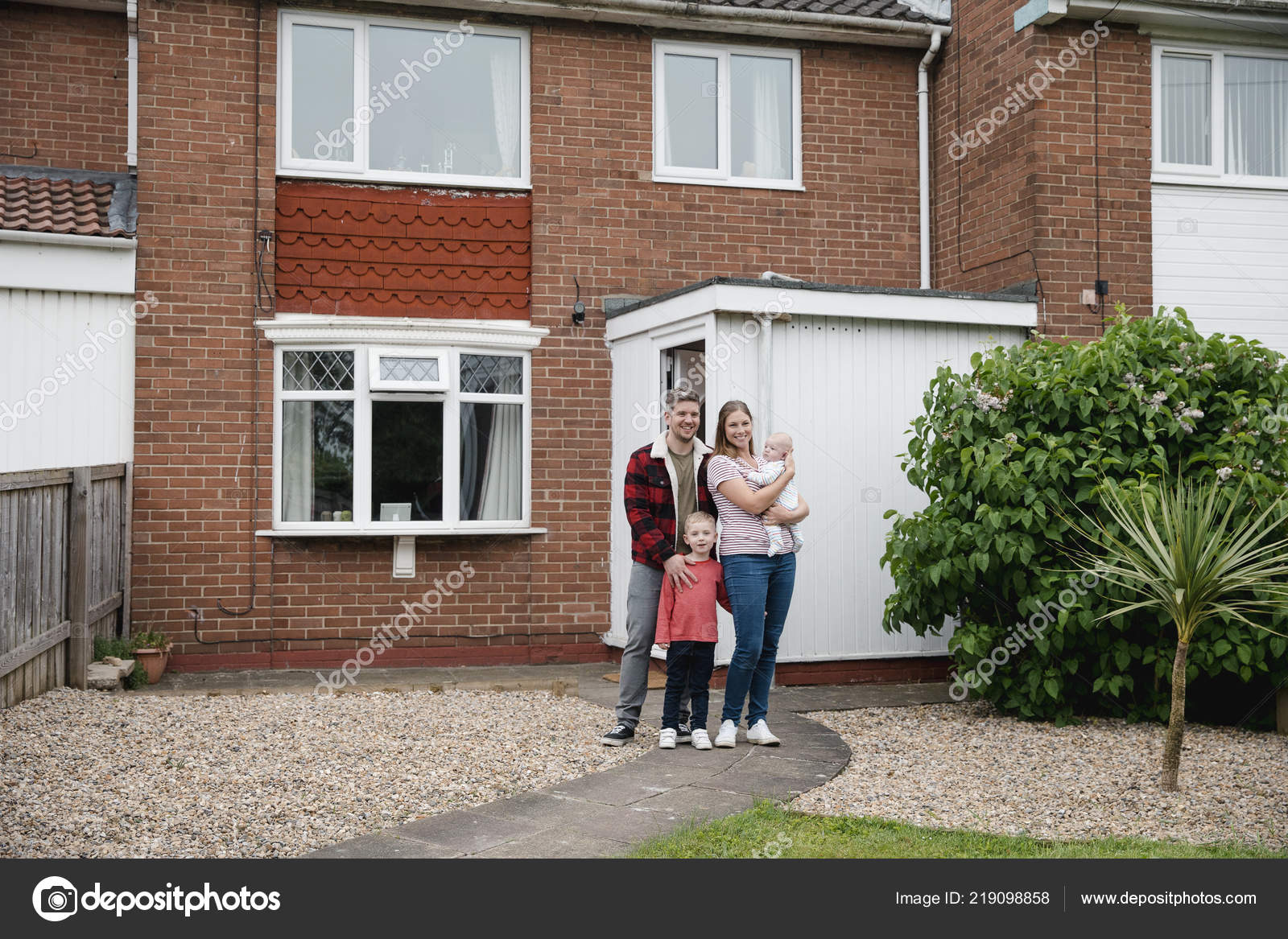 Family Two Children Standing Looking Camera While Smiling House Proud ...