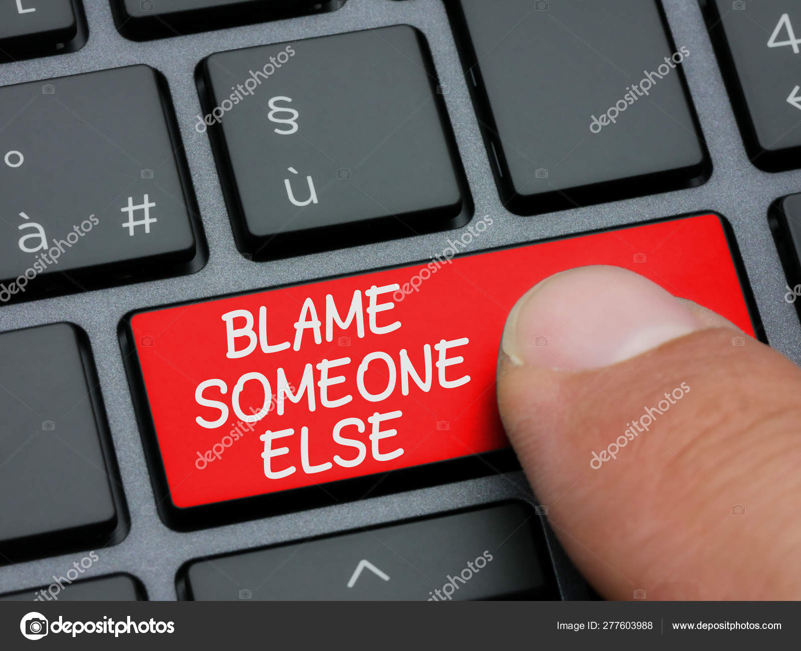 Closeup finger typing on blame someone else key on computer keyboard ...
