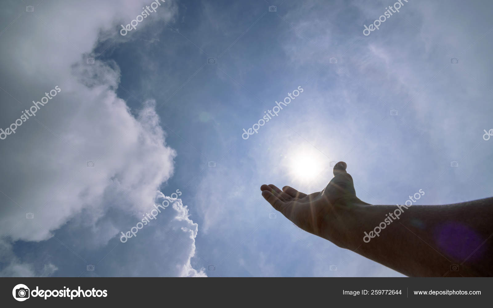 Hand praying for blessing from god on sun and clouds background, Stock ...