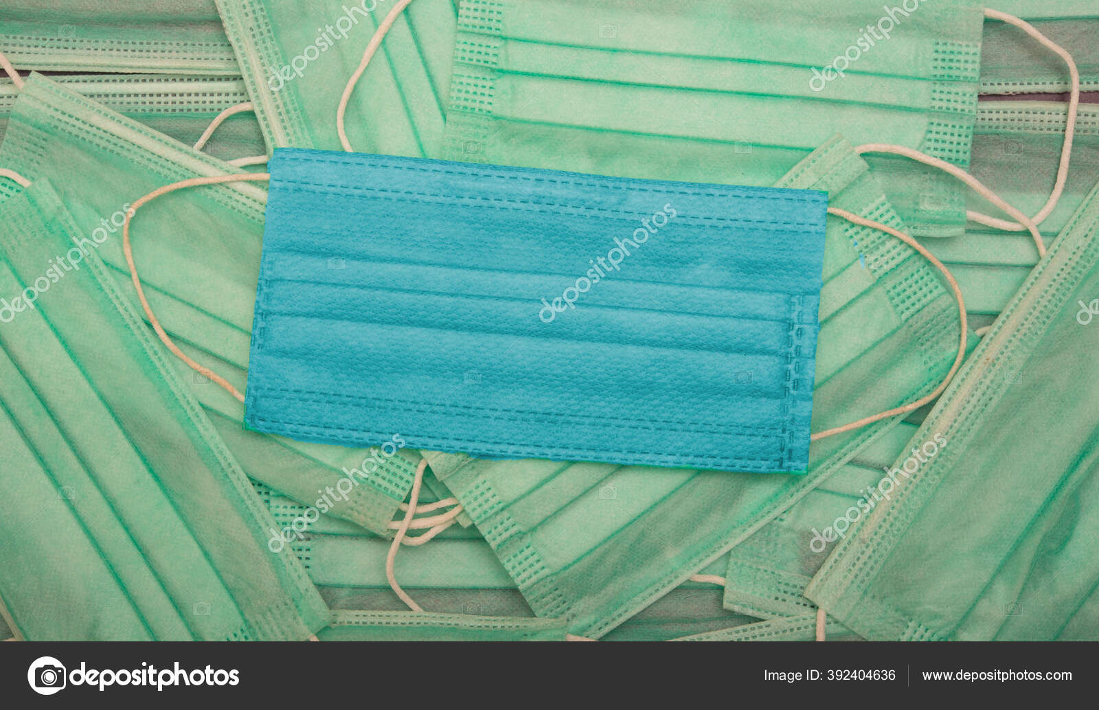 Multiple number of face masks making background - covid-19 pandemic ...