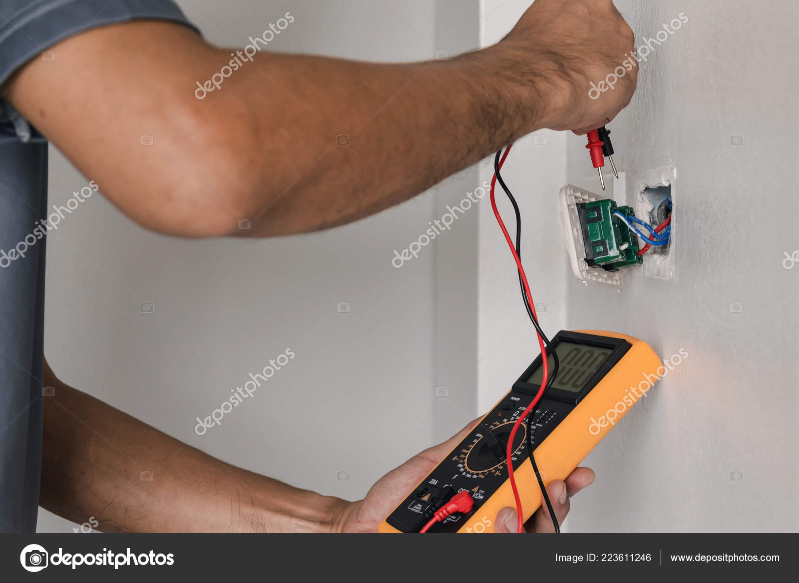 Electrician Using Digital Meter Measure Voltage Power Outlet Wall Stock ...
