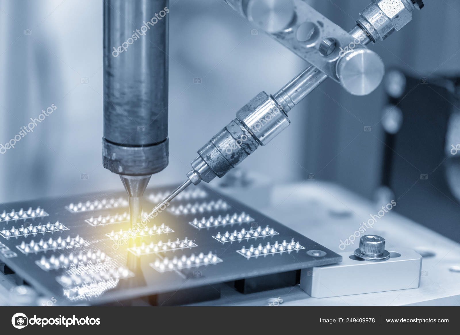 The soldering robot operation with electronic board. Stock Photo by ...