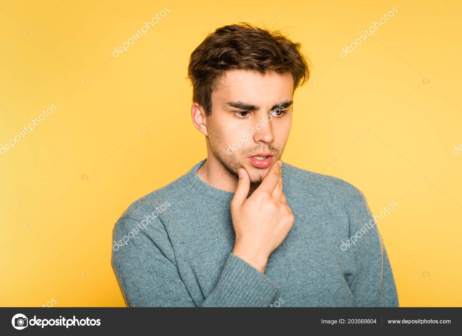 Puzzled bewildered man think scratch beard emotion Stock Photo by ...