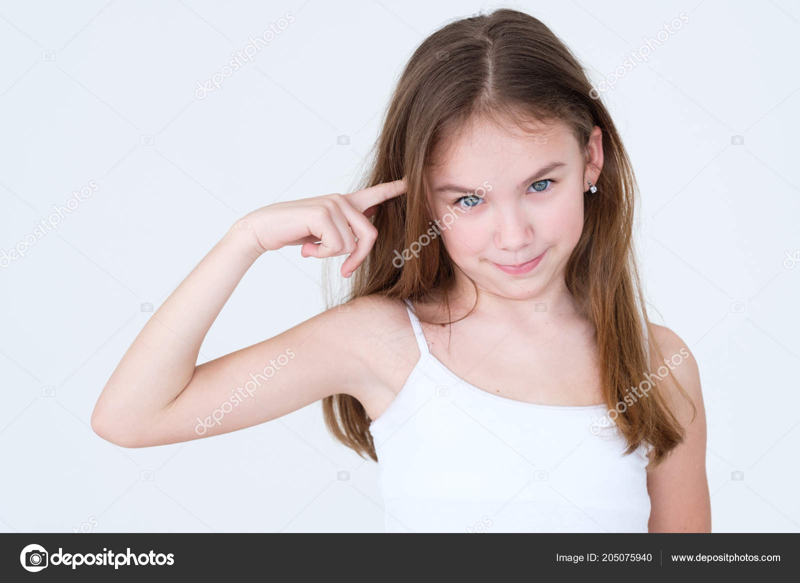 Emotion disapproving child twisting finger temple Stock Photo by ...