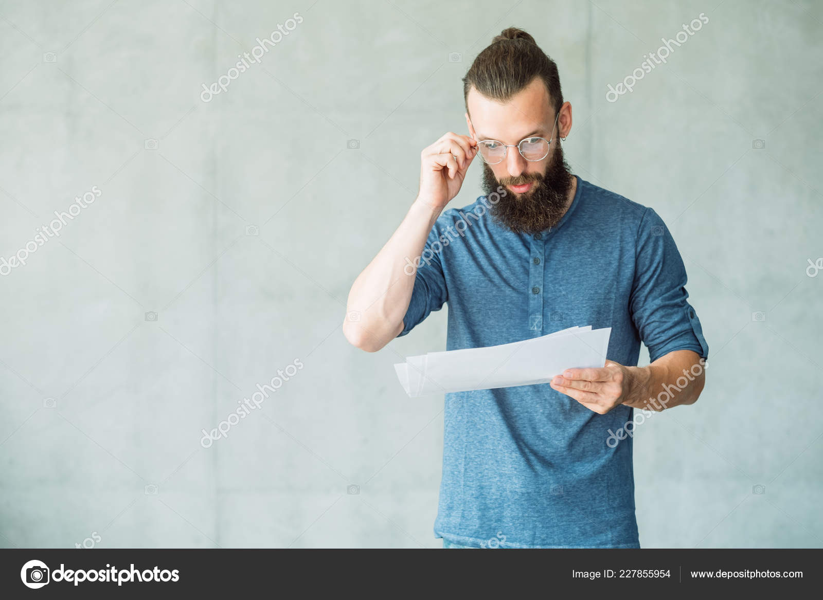 Man reading script papers focused screen writer Stock Photo by ...
