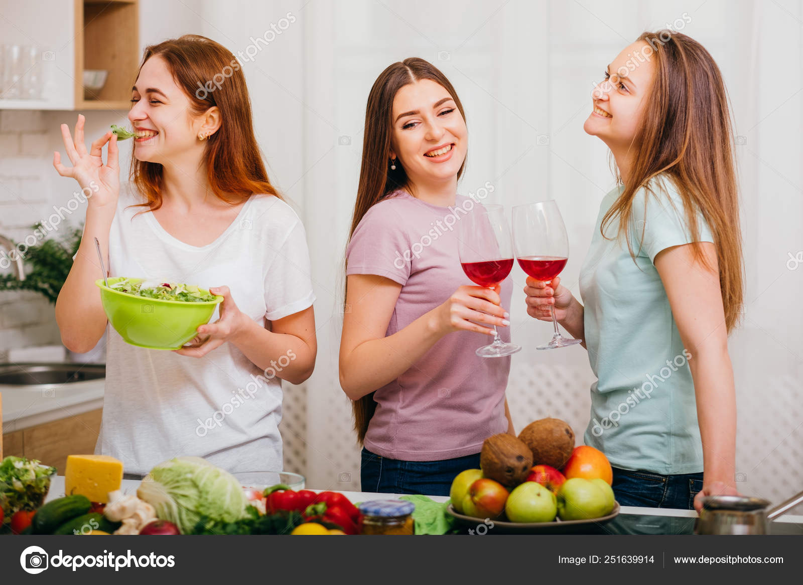 Kitchen party fun cooking leisure women wine salad Stock Photo by ...