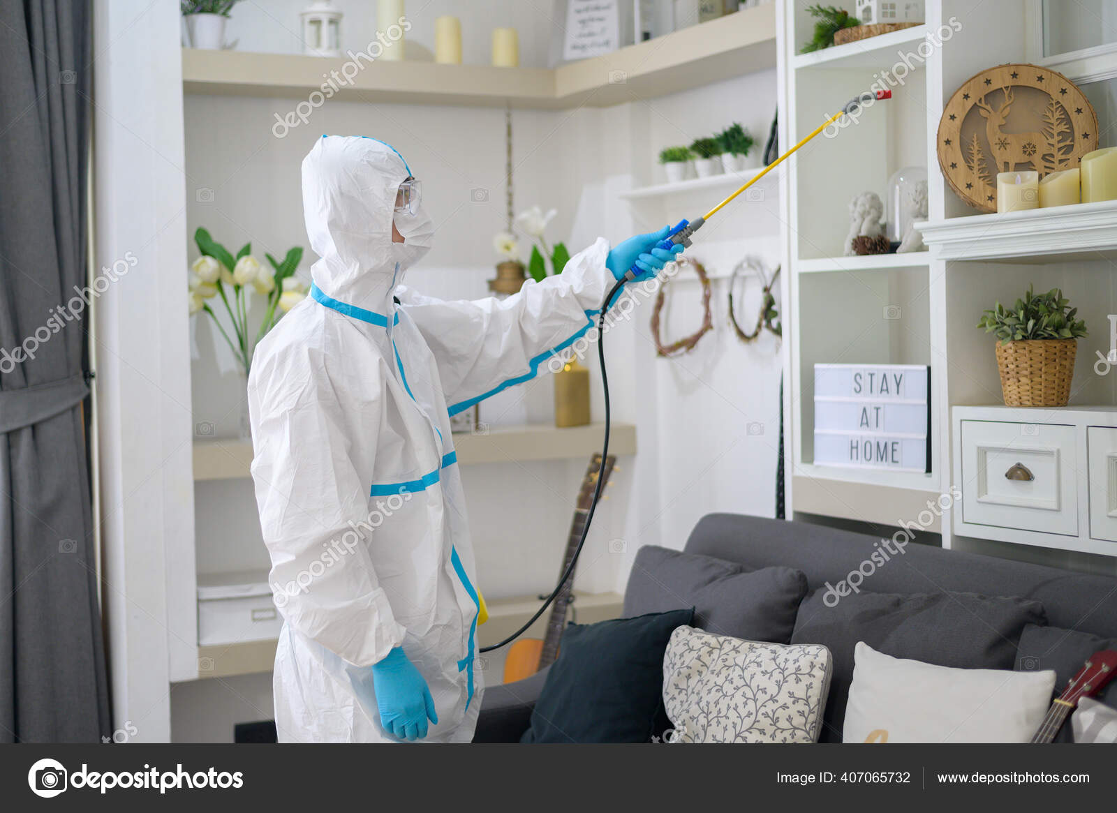 Medical Staff Ppe Suit Using Disinfectant Spray Living Room Covid Stock ...