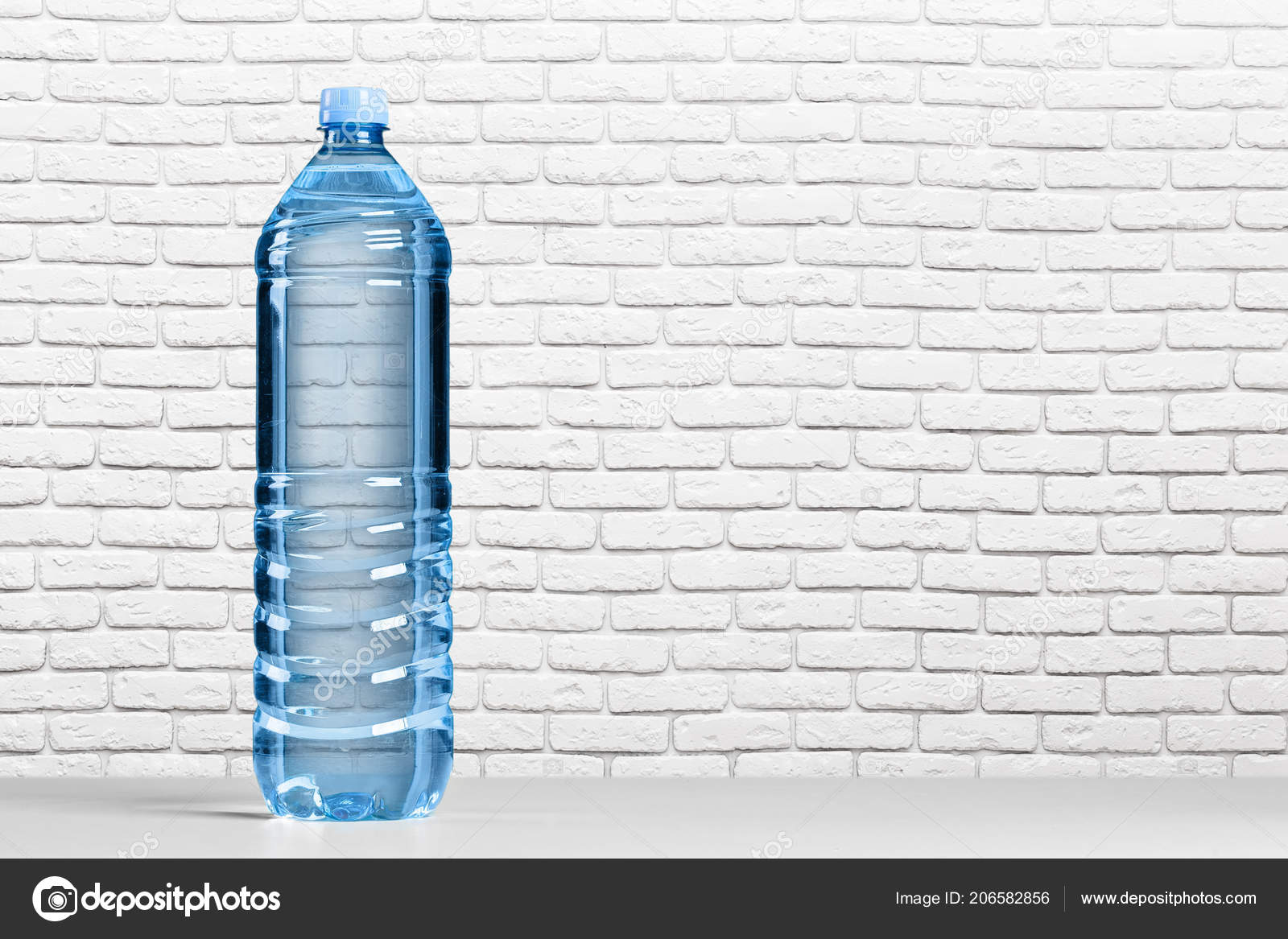 Plastic Water Bottle Table Stock Photo by ©Fotofabrika 206582856