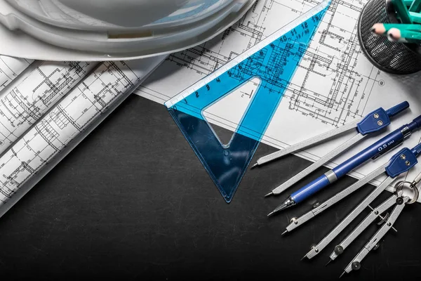 Construction planning drawings on dark background - Stock Image ...