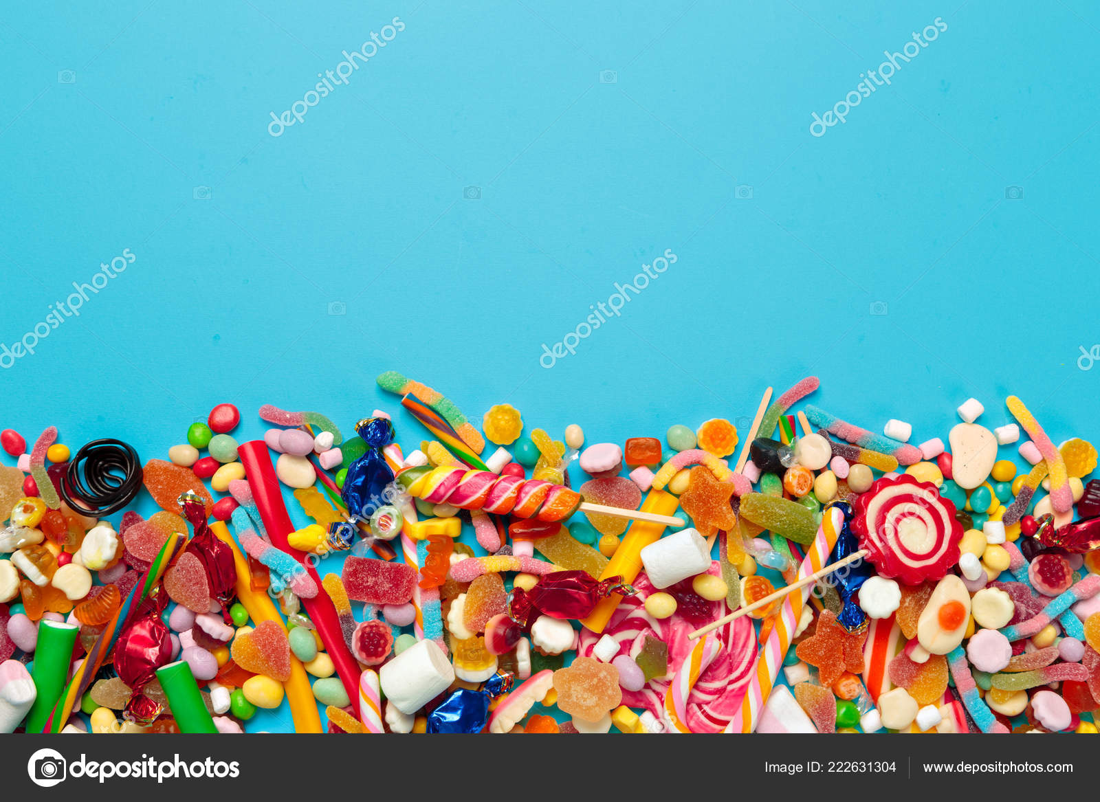 Colored Candies Blue Background Stock Photo by ©Fotofabrika 222631304