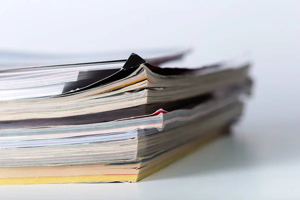 Close Magazine Stack White Background Stock Photo by ©Fotofabrika 221602058