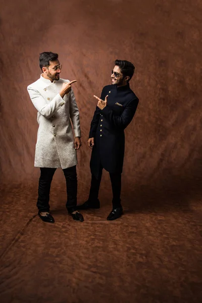 two Indian men wears ethnic or traditional cloths, Male fashion models ...