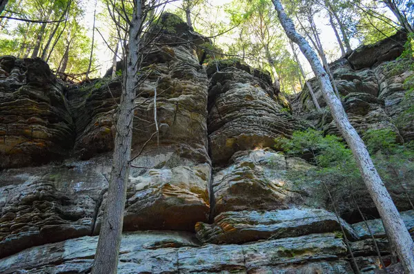 light blue stream of water flowing through a forest - Stock Image ...