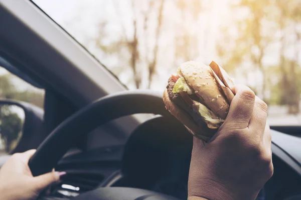 Eating while driving Images - Search Images on Everypixel