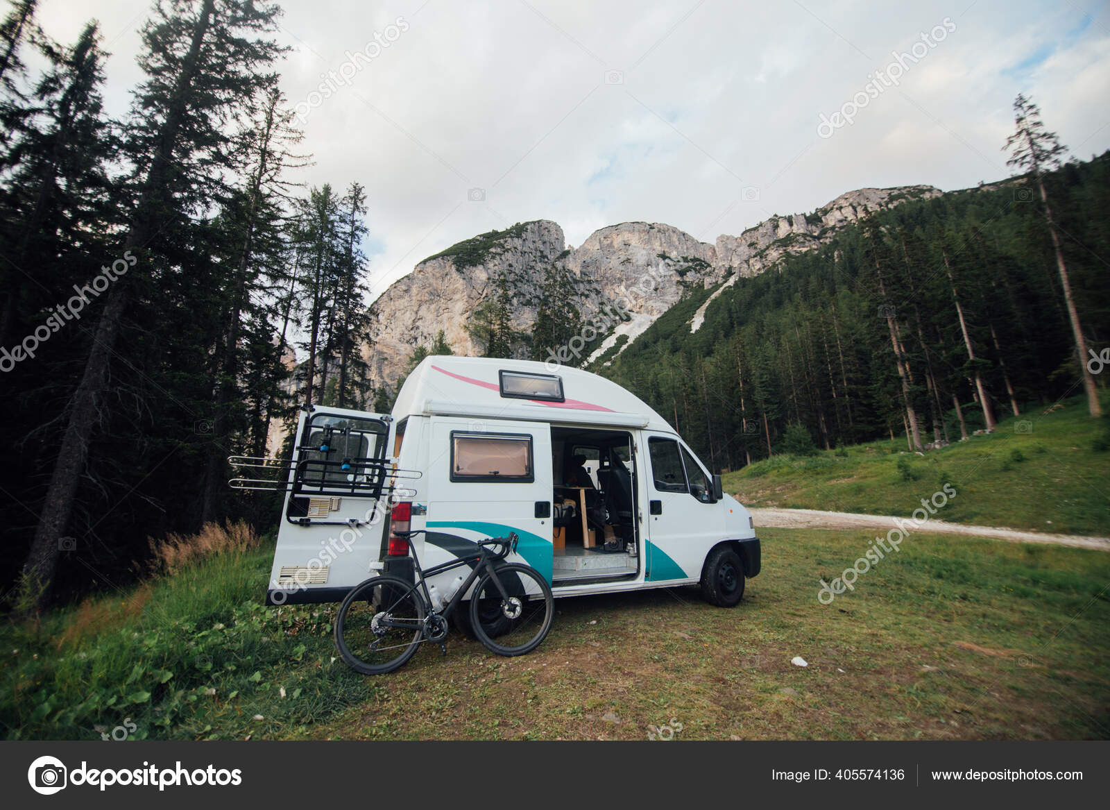 Cute camper van RV in wild camping spot in nature Stock Photo by ...