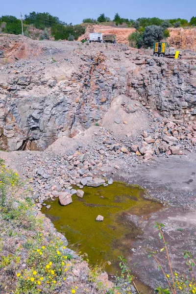 Spectacular view of quarry open pit mining of granite stone. Process ...