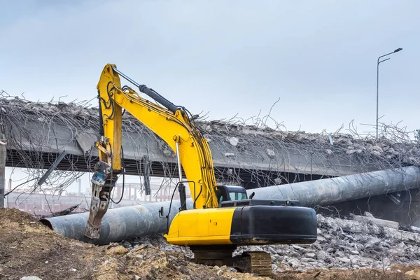 Professional demolition of reinforced concrete structures using Stock ...