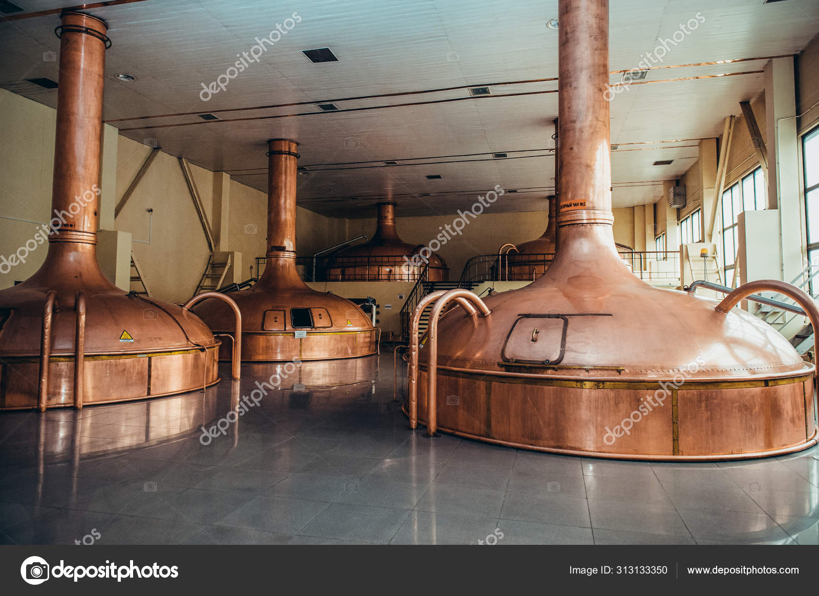 Brewing production - mash vats. Modern brewery factory interior. Steel ...